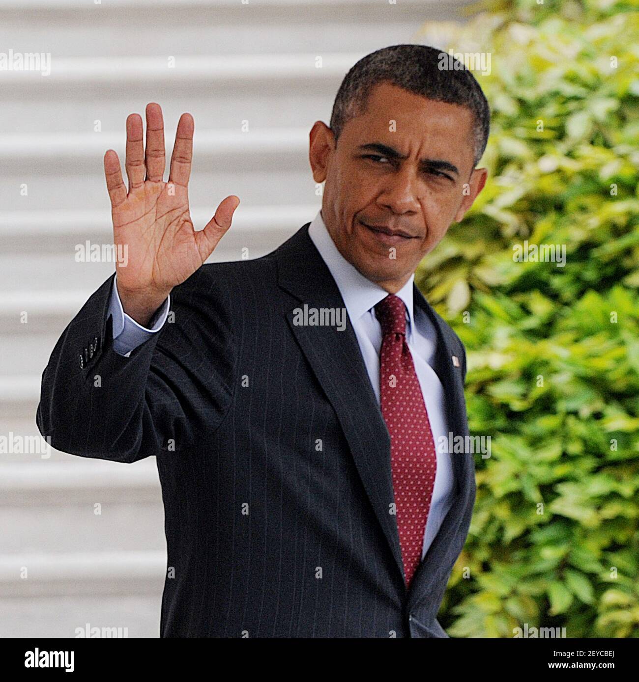 President Barack Obama walks across the South Lawn as he departs the ...
