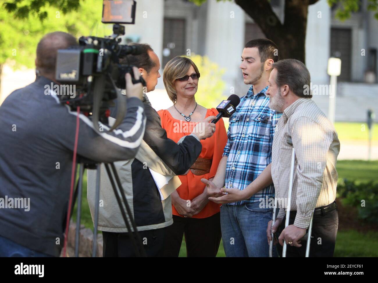 Shawn Hornbeck, center, talks with members of the media in St. Louis ...