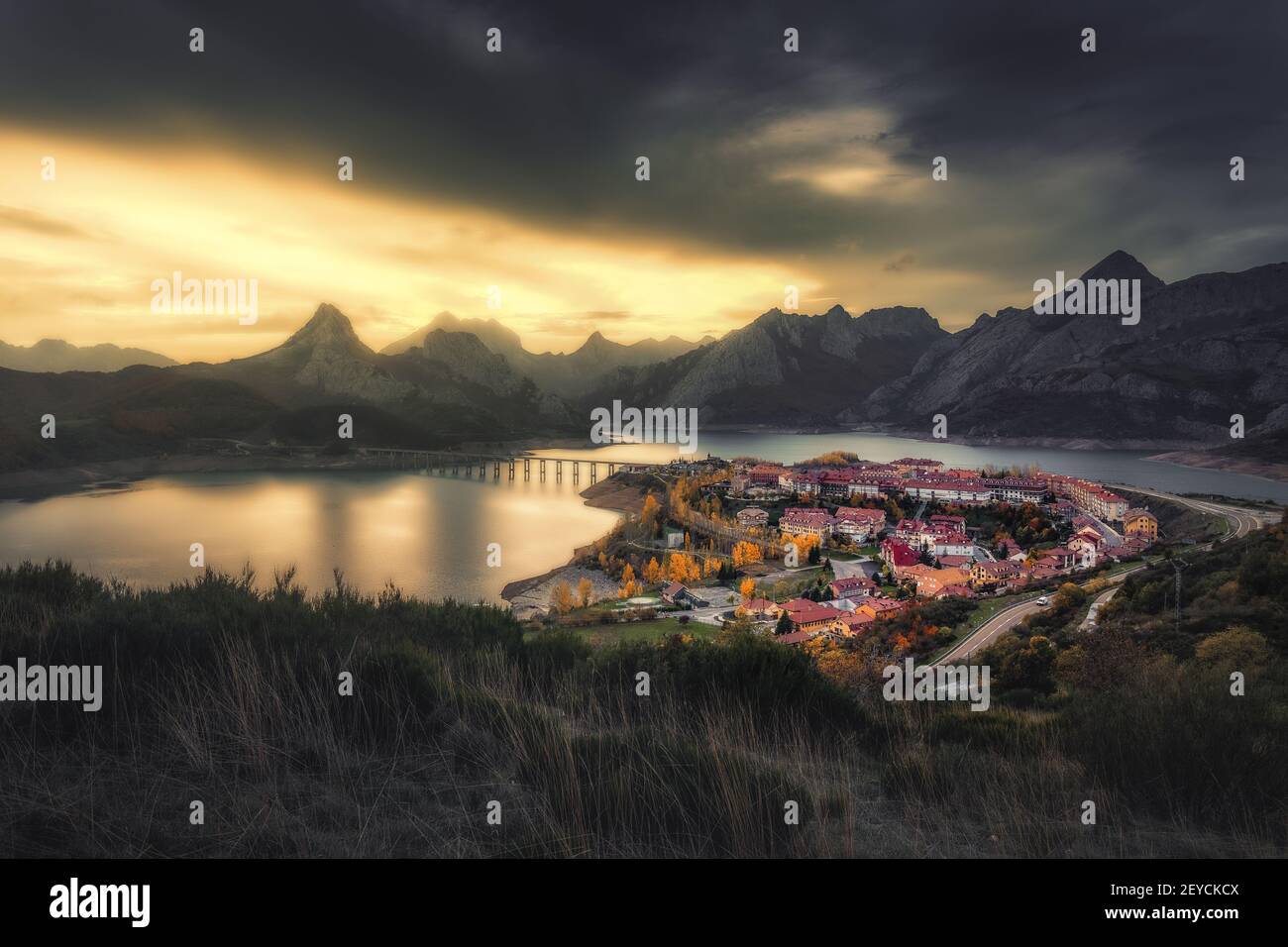 A landscape of the Riano village surrounded by rocky hills during the ...