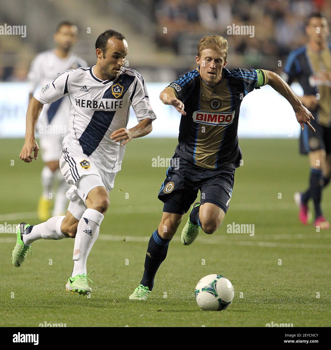 Philadelphia Union's Brian Carroll, right, defends Los Angeles Galaxy's ...