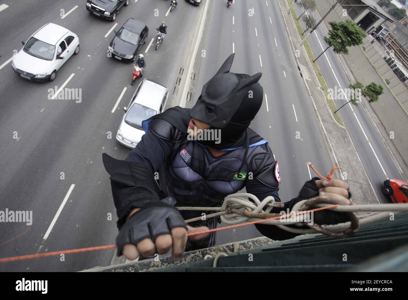A men dressed as Batman, and another one as Robin, in protest ...