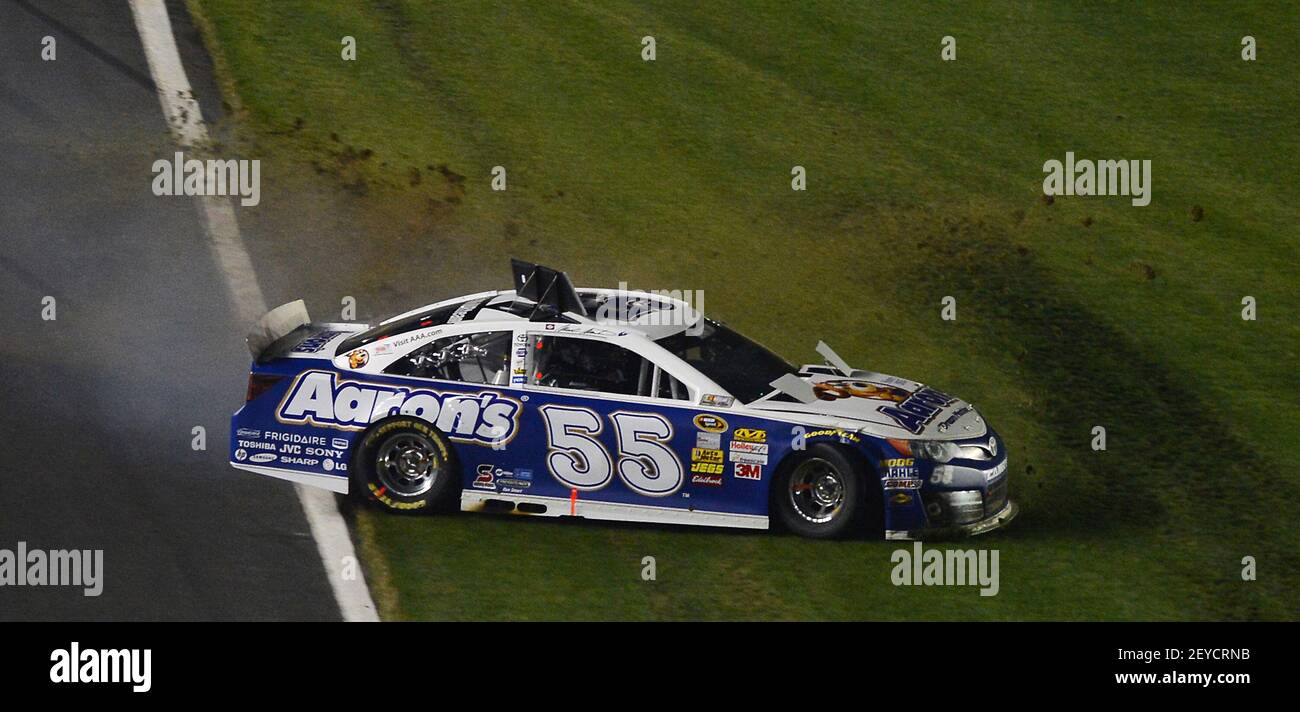 Mark Martin (55) tries to maintain control of his car after he avoided ...