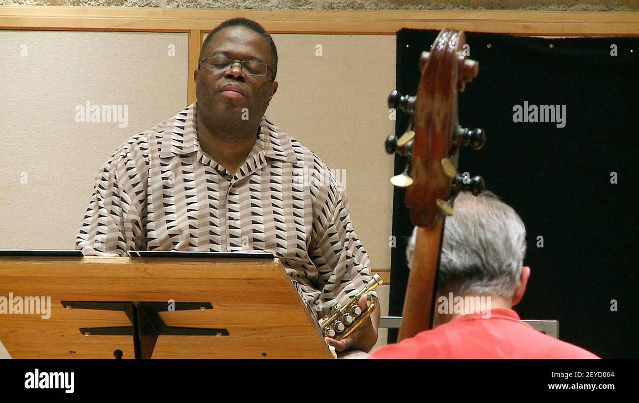 Composer/trumpeter Orbert Davis is in a reflective mood as he directs ...
