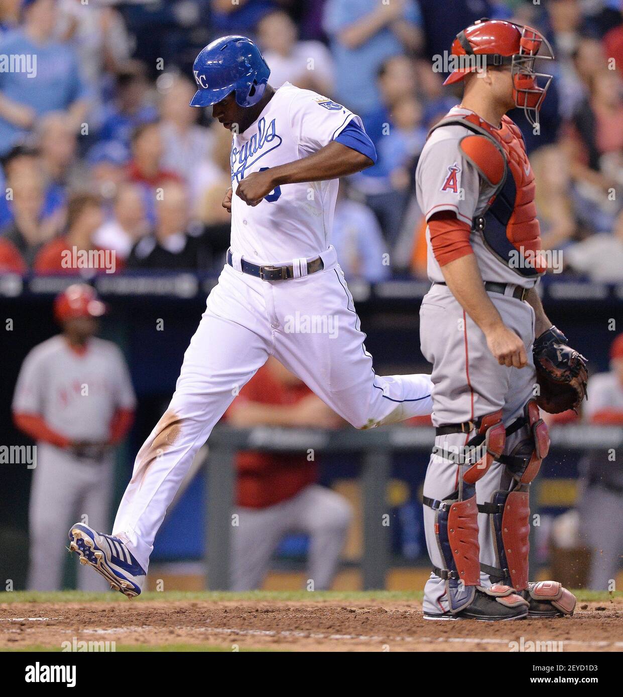 Kansas City Royals' Lorenzo Cain (6) scores behind Los Angeles Angels ...