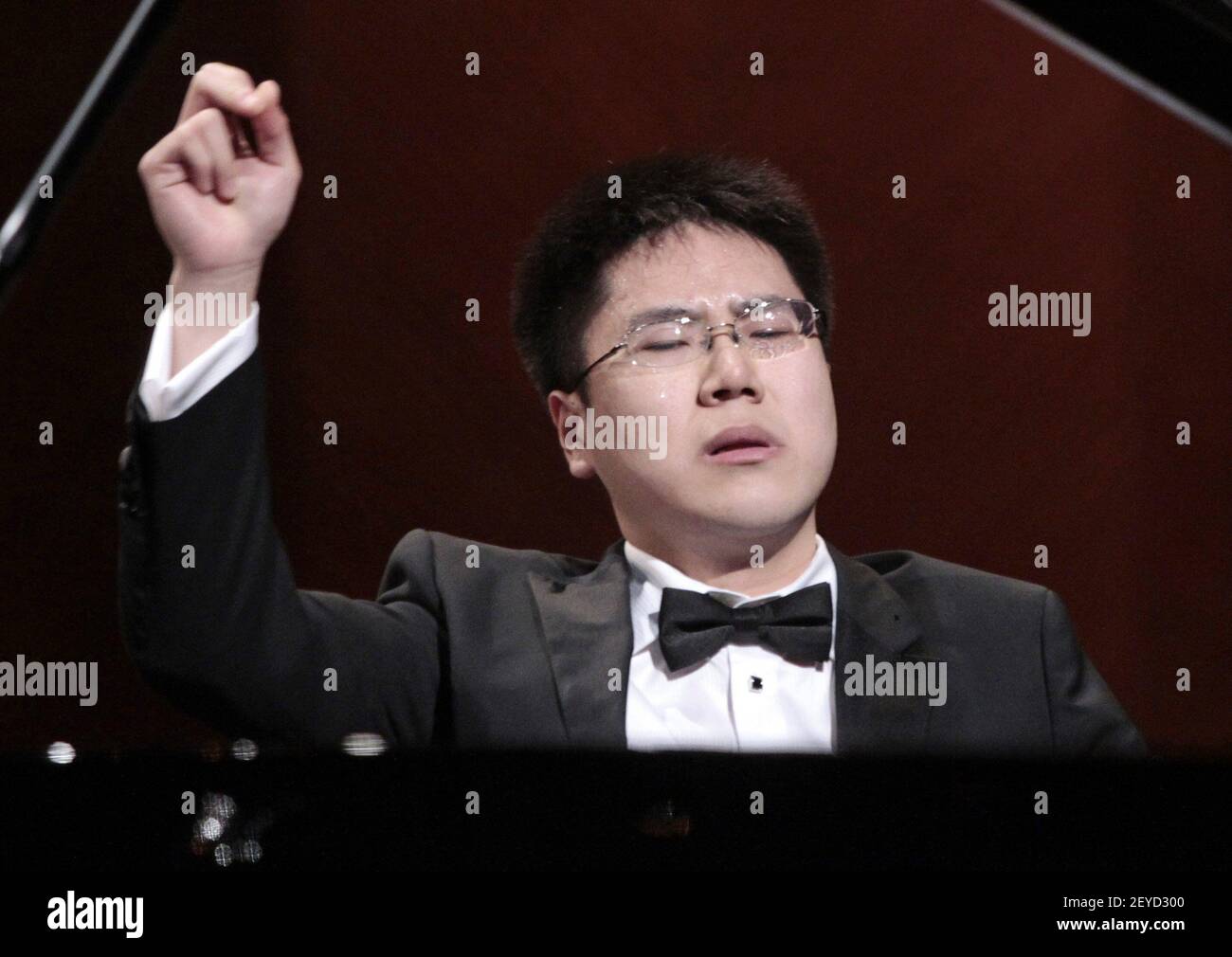 Ruoyu Huang, of China, performs in the 14th Van Cliburn International ...