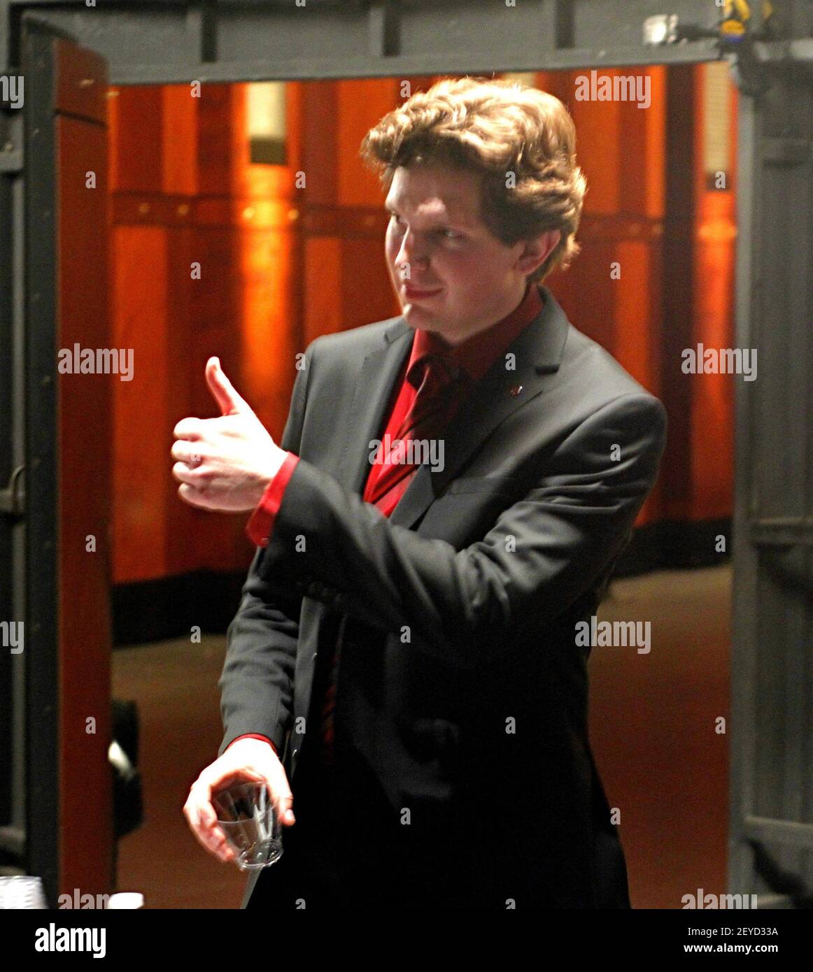 Jayson Gillham, of Australia, gives a encouragement to another pianist ...