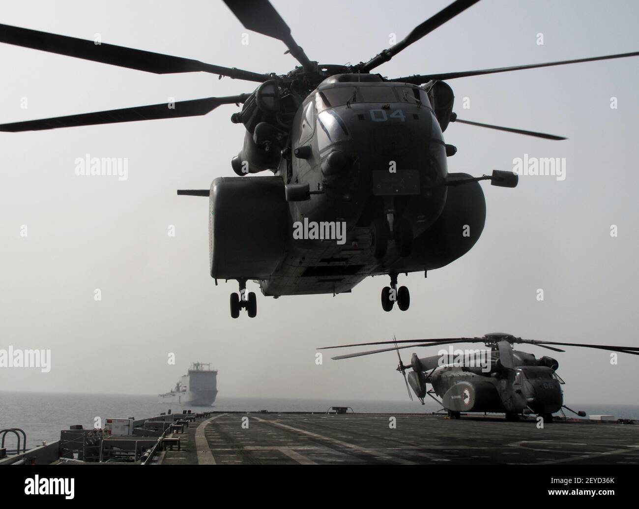 A U.S. Navy MH-53E Sea Dragon helicopter assigned to Helicopter Mine ...