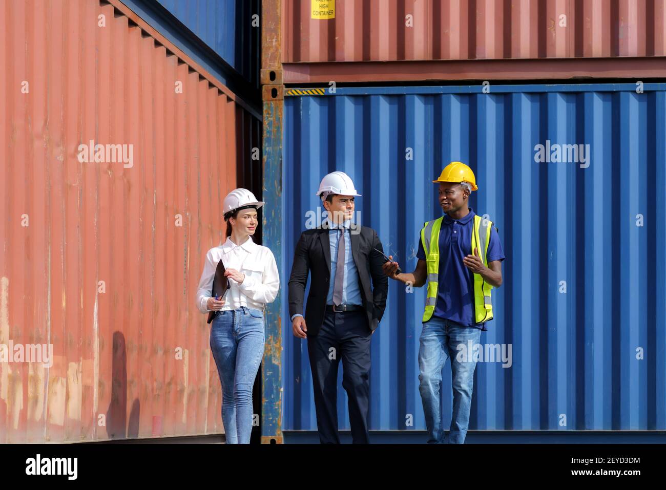 African american foreman is explaining the various sections of the ...