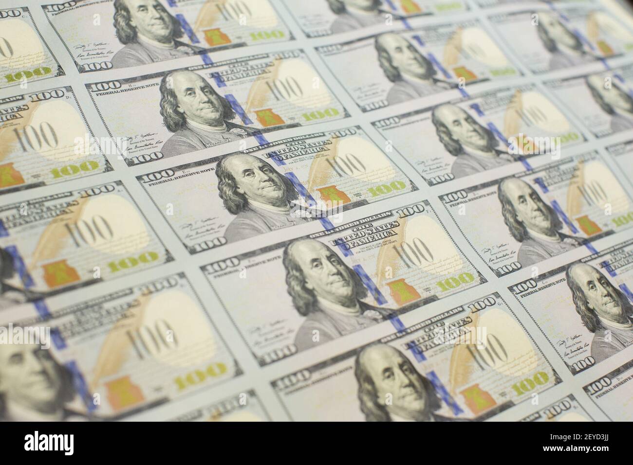 The newly redesigned $100 bill being printed at the Bureau of Engraving ...