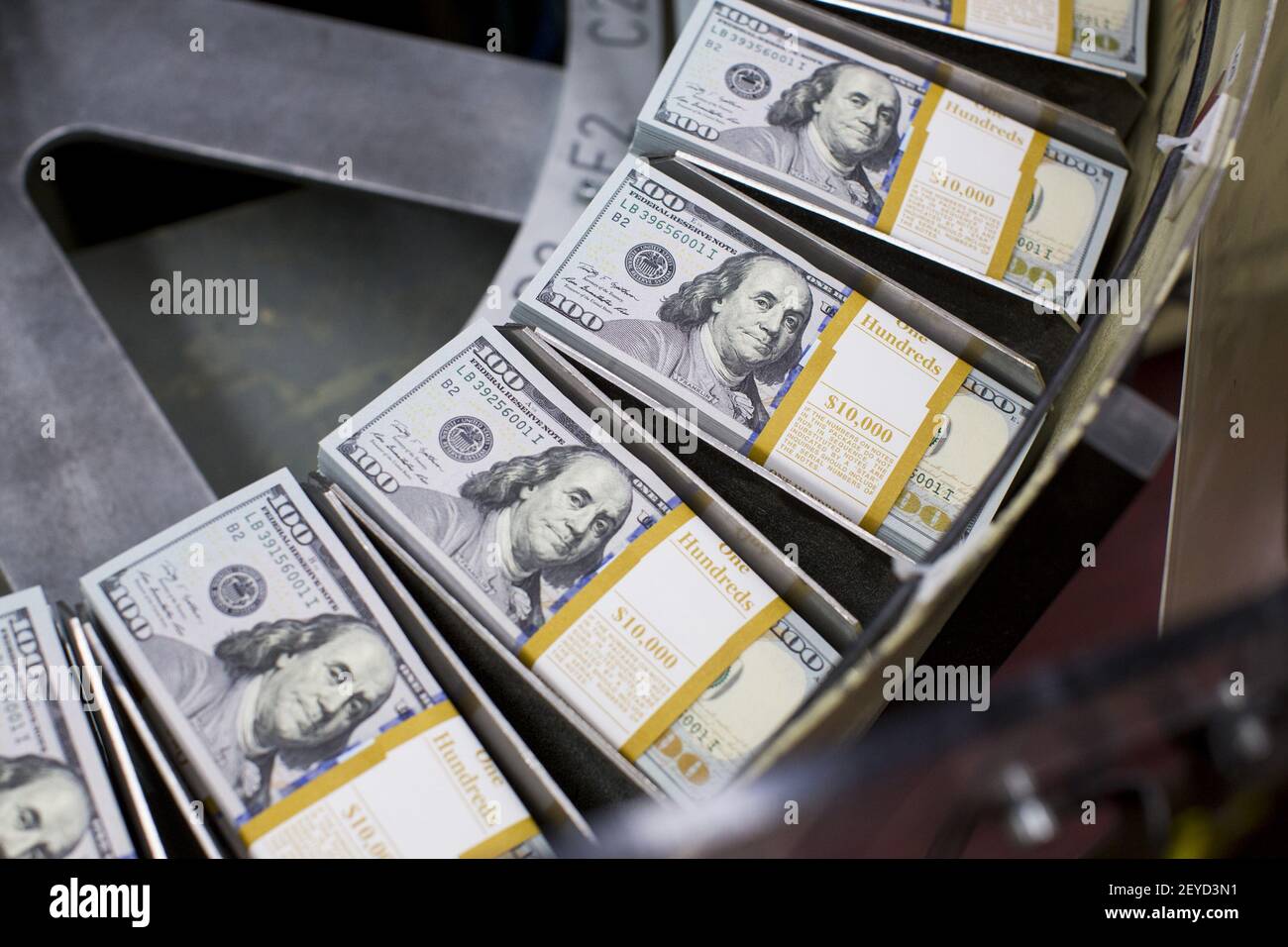 The newly redesigned $100 bill being printed at the Bureau of Engraving ...