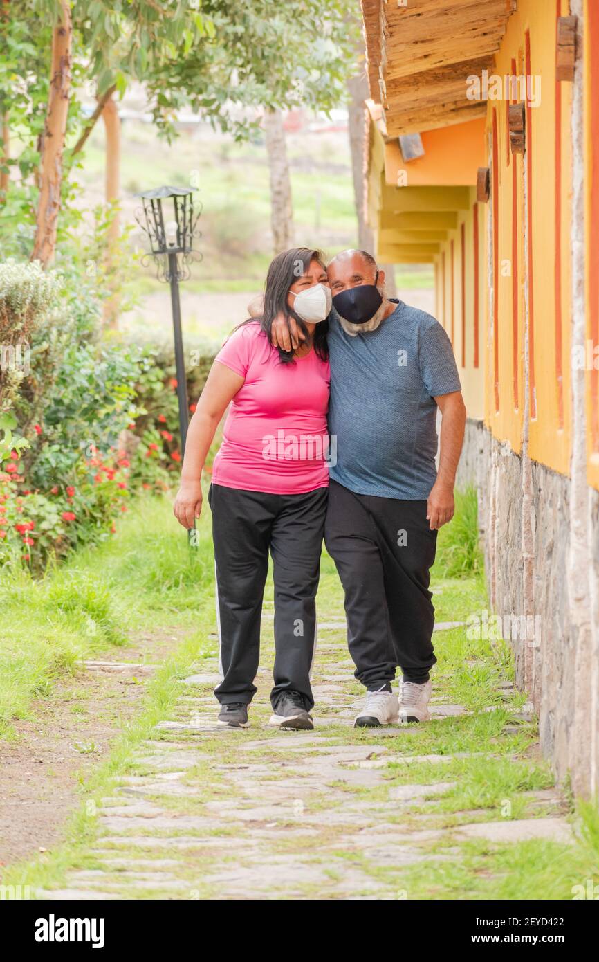 A happy senior couple in face walking outdoors Stock Photo - Alamy