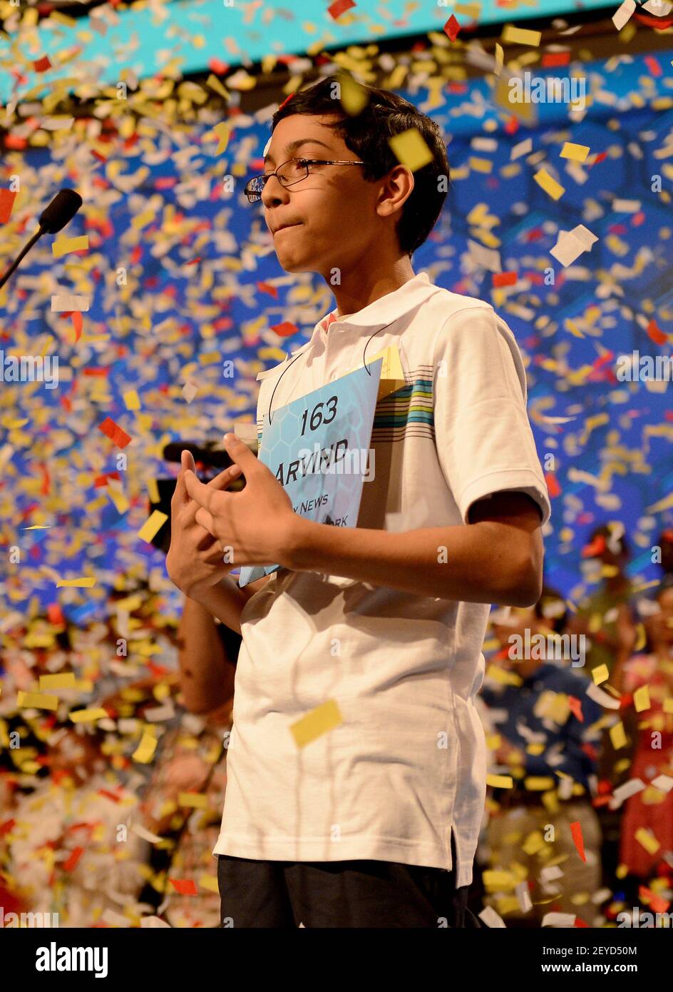 Scripps National Spelling Bee winner Arvind Mahankali of Bayside Hills, New York, stands in a ...