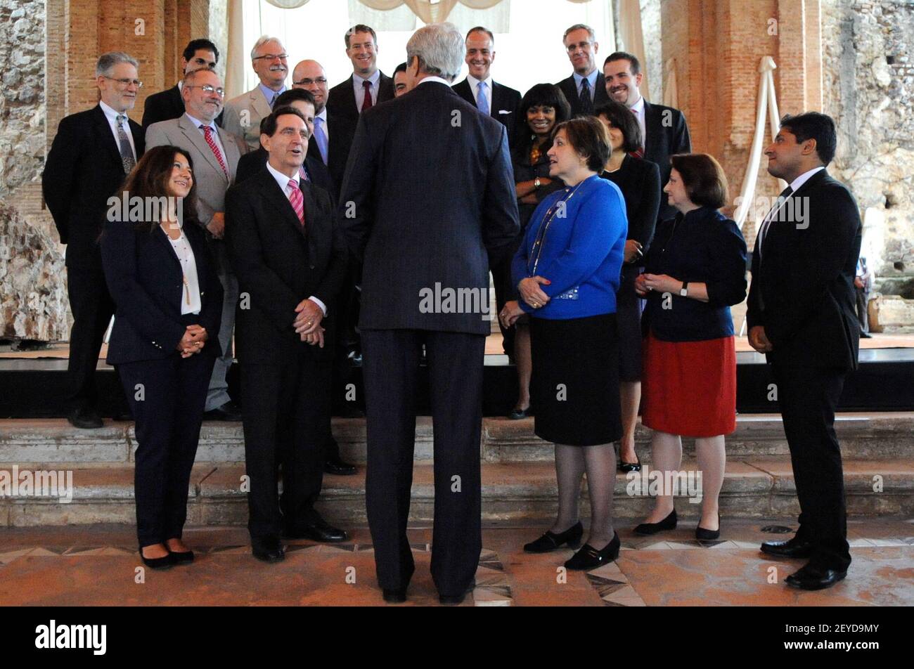 U.S. Secretary of State John Kerry speaks with U.S. Mission to the ...