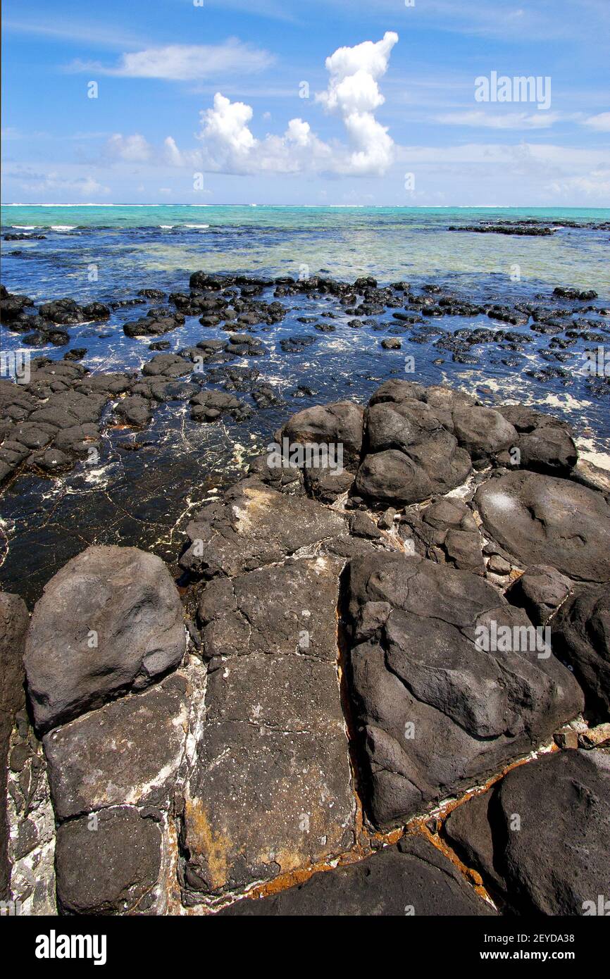 Foam indian ocean some stone the island Stock Photo - Alamy