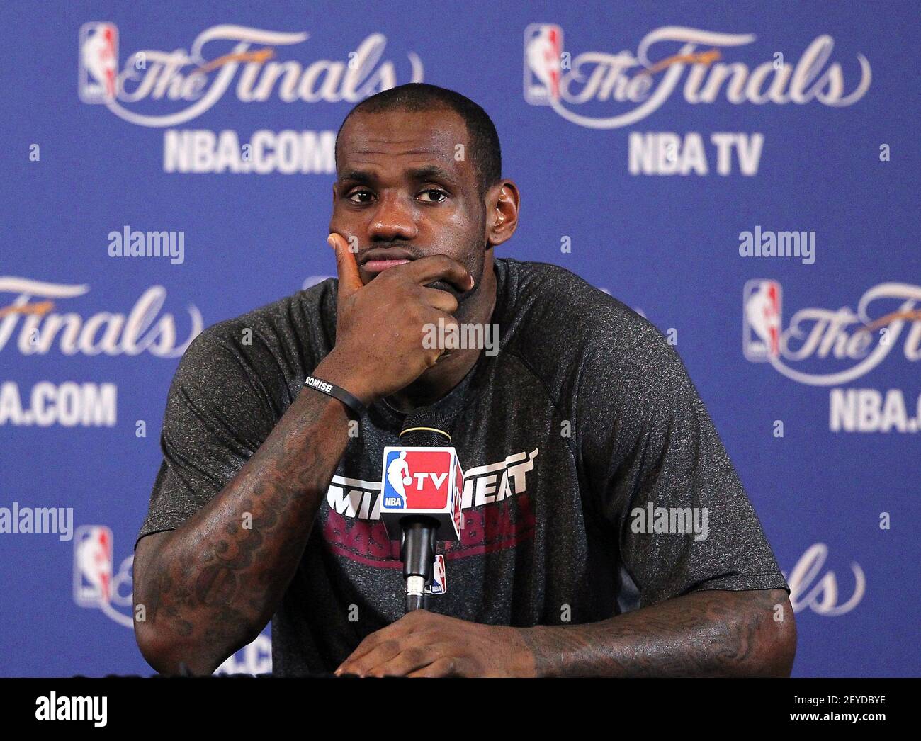 Miami Heat forward LeBron James speaks with reporters before the team ...