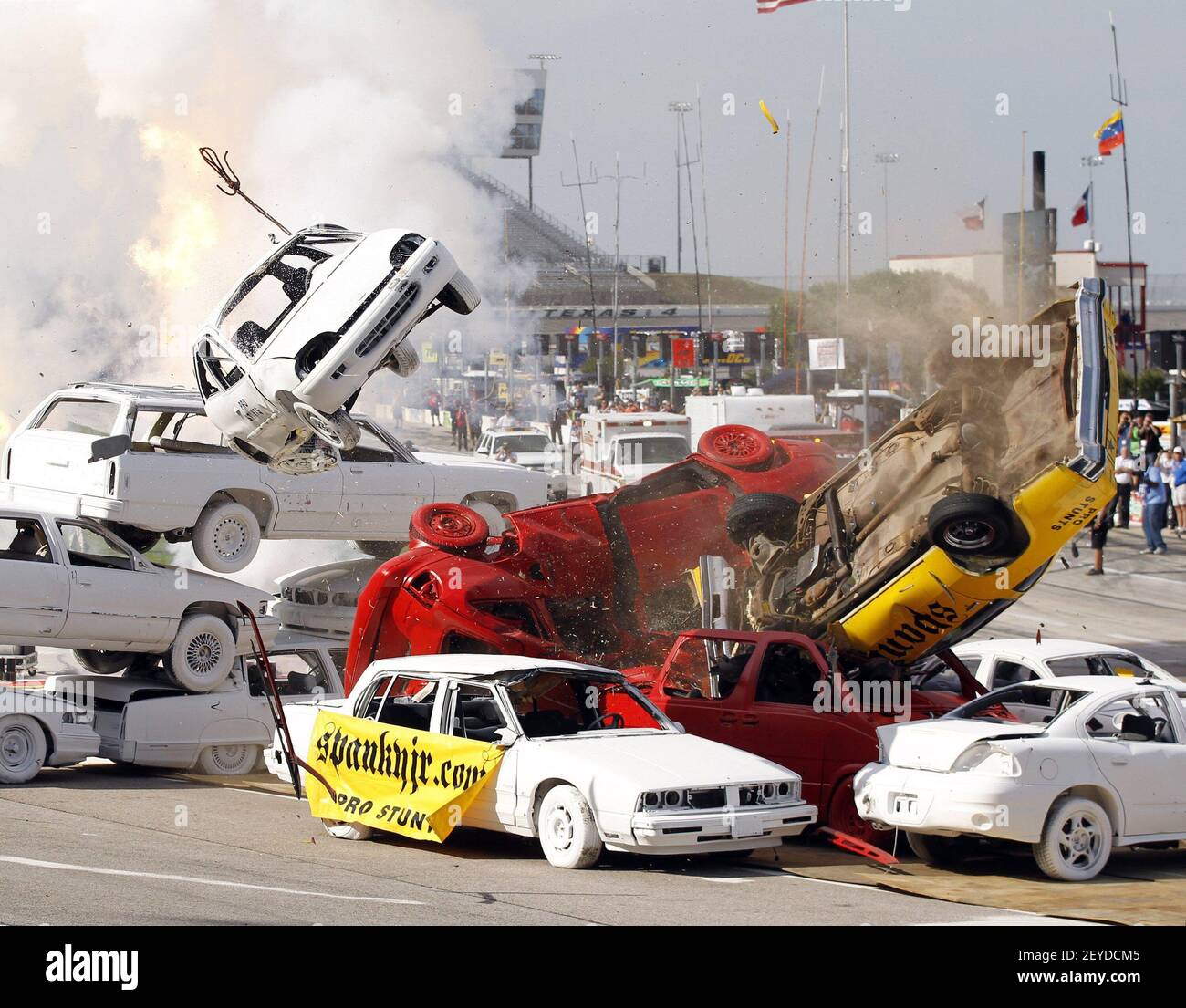 Spanky Spangler, Jr. jumps through a "car pyramid" before the start of ...
