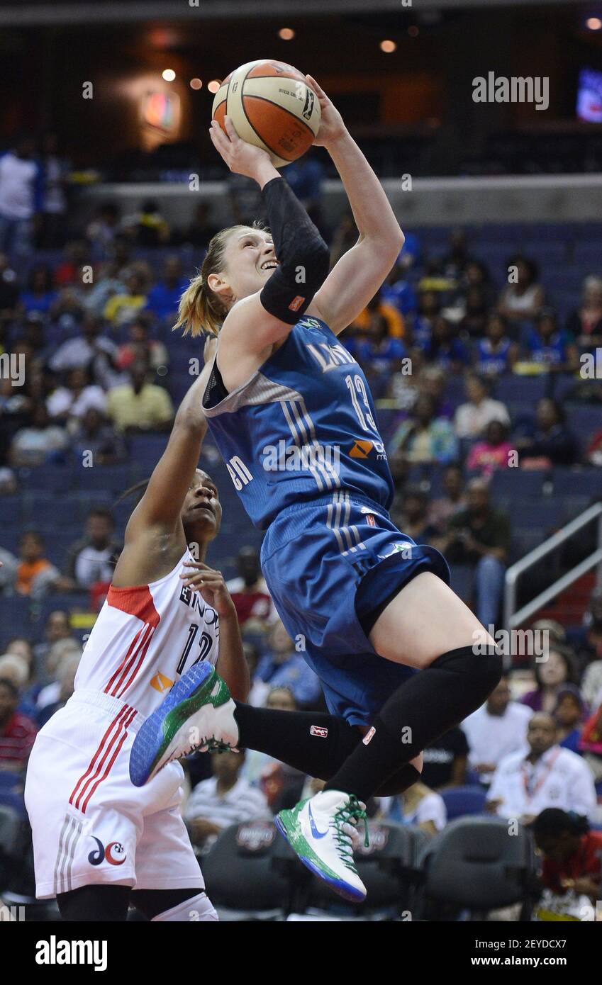 Minnesota Lynx guard Lindsay Whalen (13) takes a twisting shot and ...