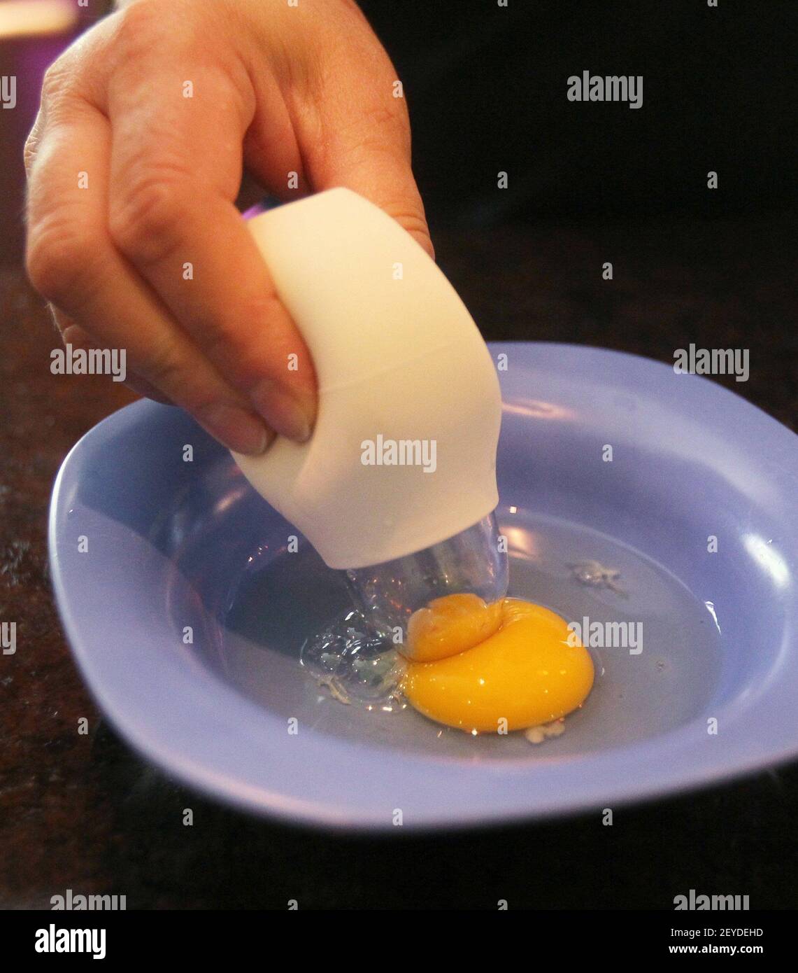 Lisa Abraham tests the Sunny Side Out egg white separator. It claims to ...