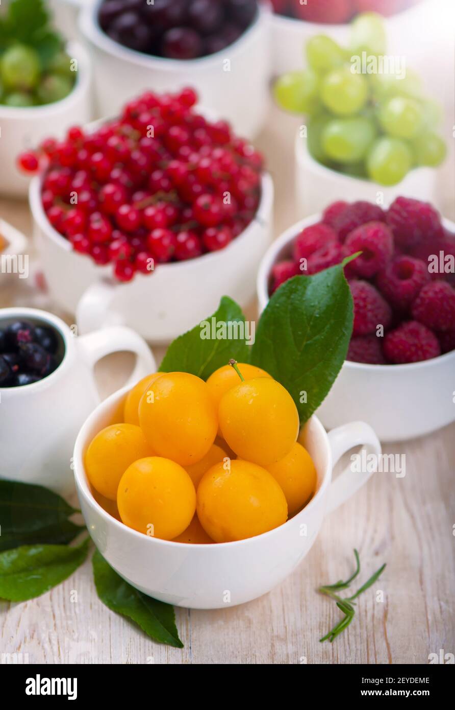 berry mix isolated on a white background Stock Photo - Alamy