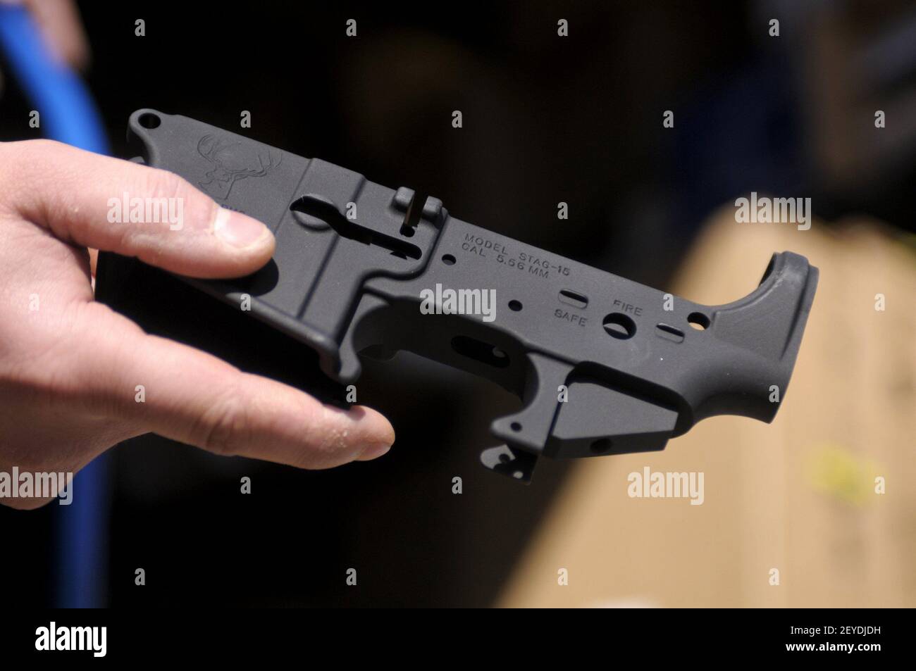 A serial receiver for an AR-15 rifle is shown at Stag Arms in New ...