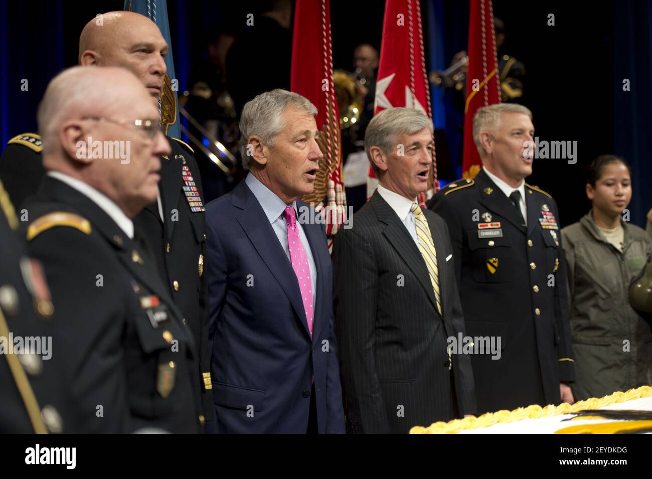 Secretary of Defense Chuck Hagel (center) along with (left to right ...