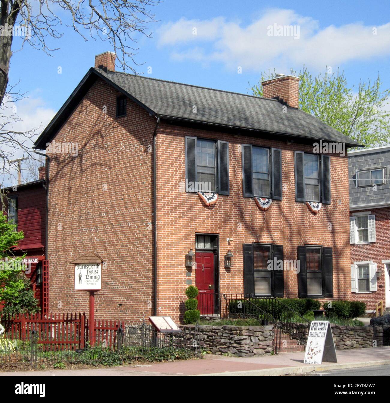 The brick wall of the Farnsworth House Inn was hit by many bullets ...