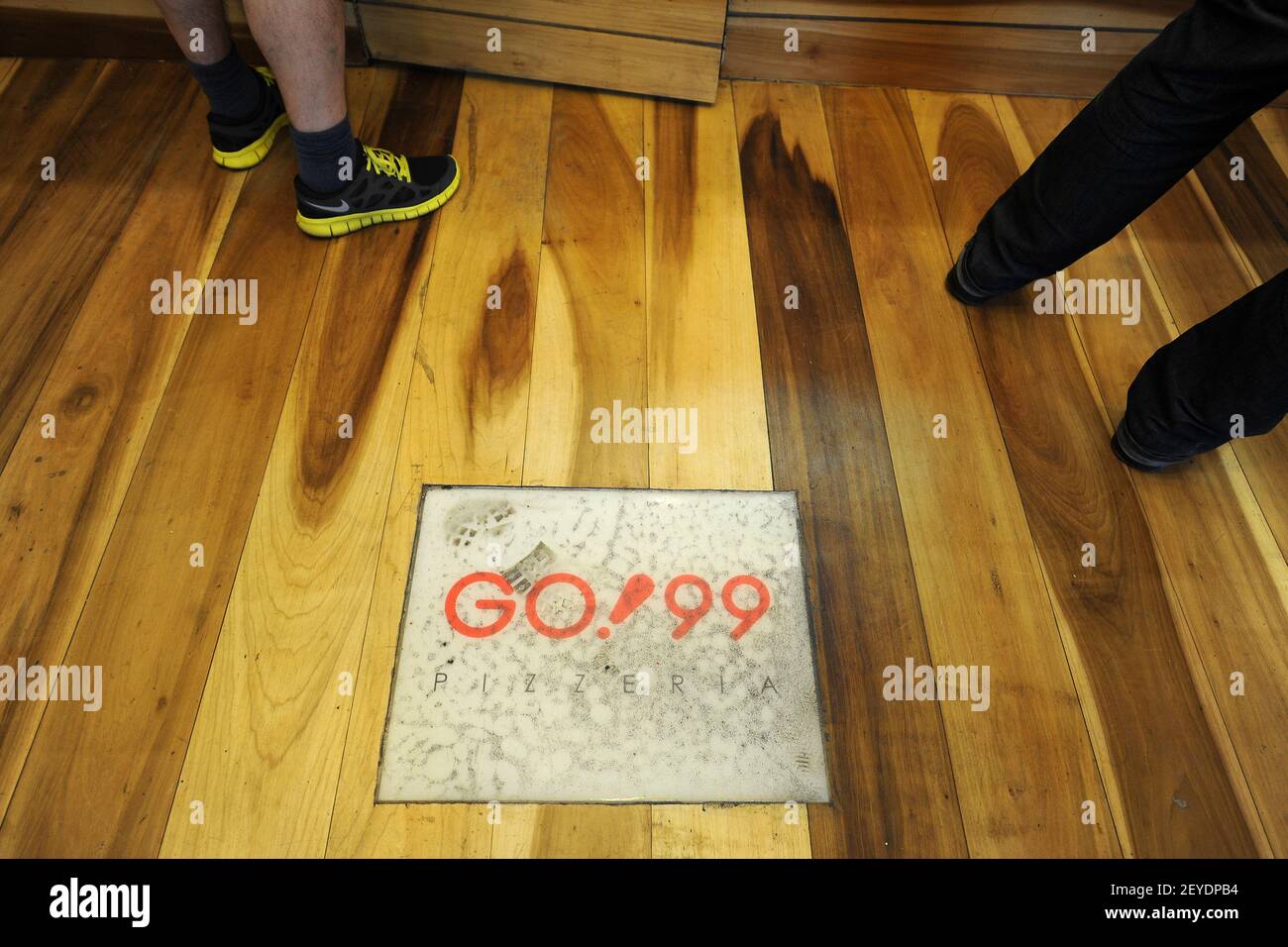 GO!99 logo imbedded in the floor of it's upper east side store where it ...