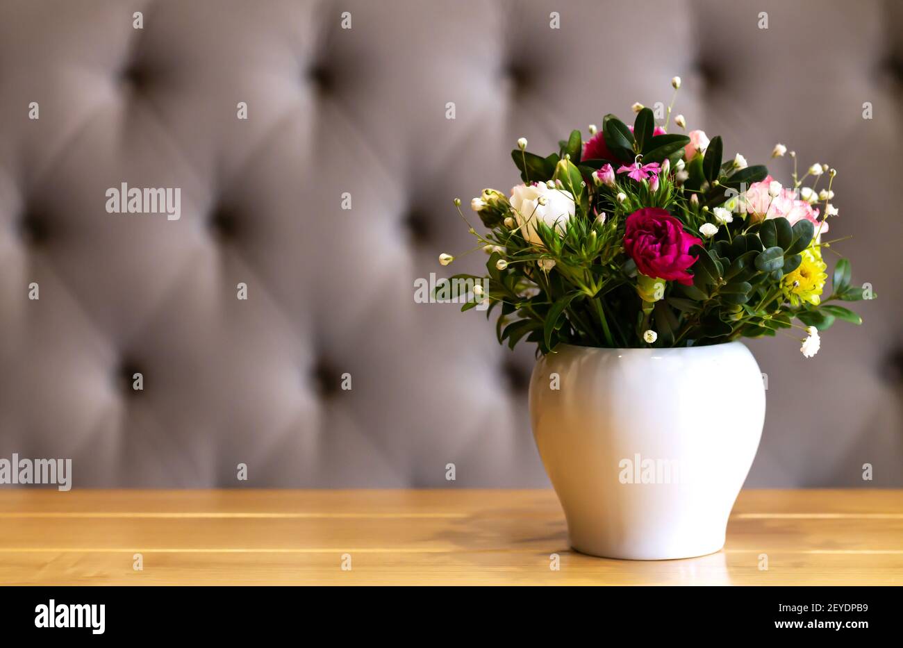 Modern living room interior design with small flower vase with fresh ...