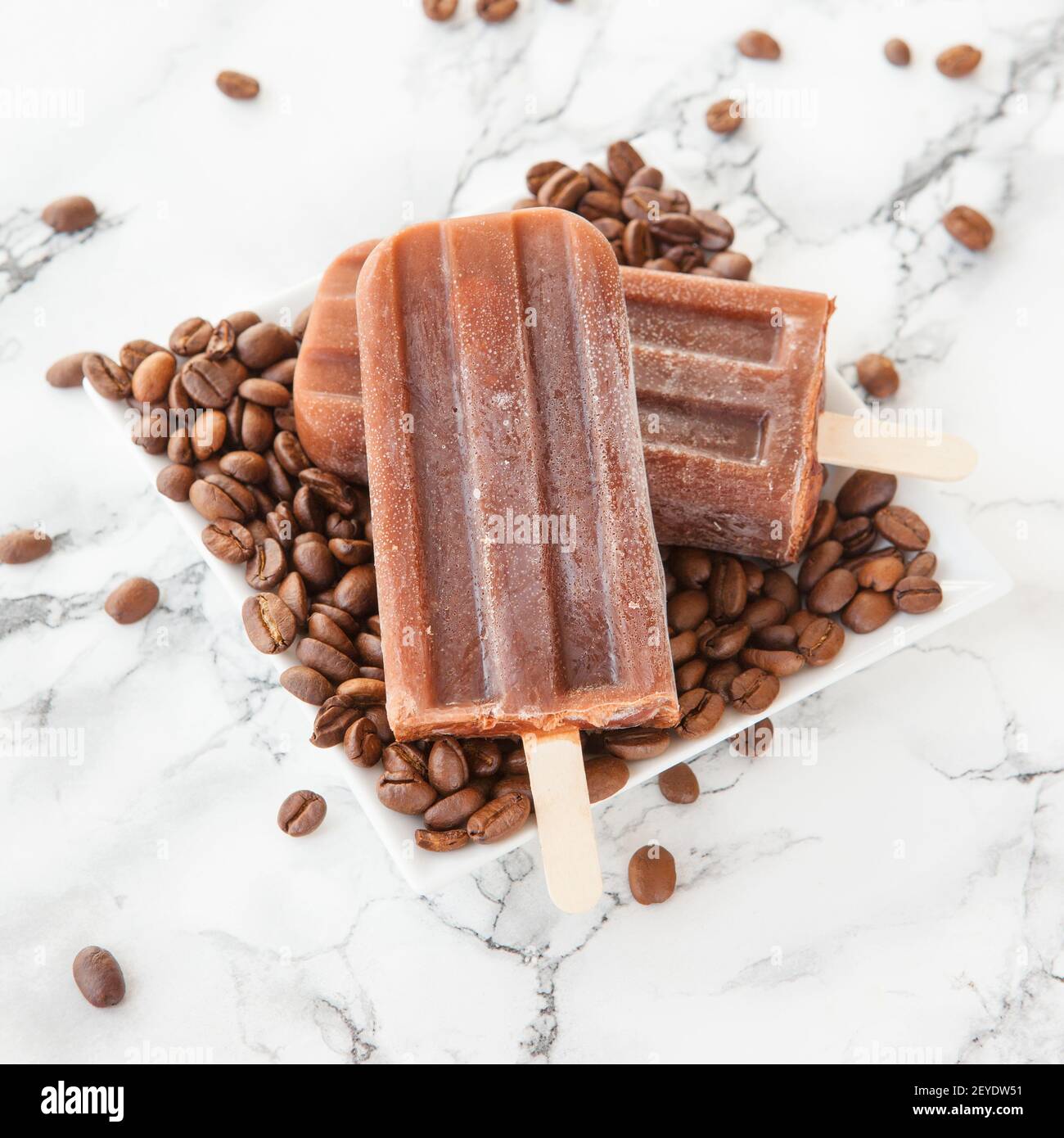Frozen coffee on a stick Stock Photo - Alamy