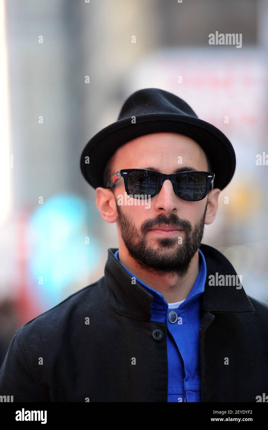 French Artist JR poses for a portrait in Times Square on April 27, 2013 ...