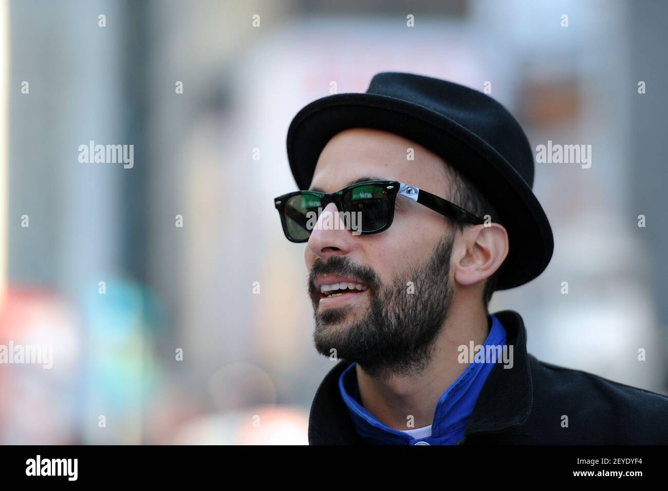 French Artist JR poses for a portrait in Times Square on April 27, 2013 ...