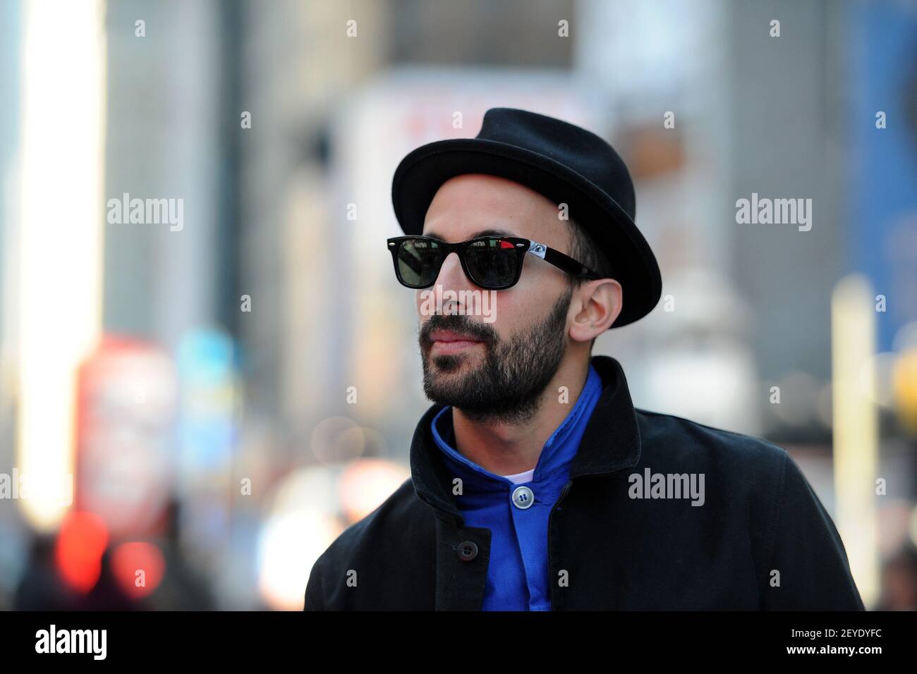 French Artist JR poses for a portrait in Times Square on April 27, 2013 ...