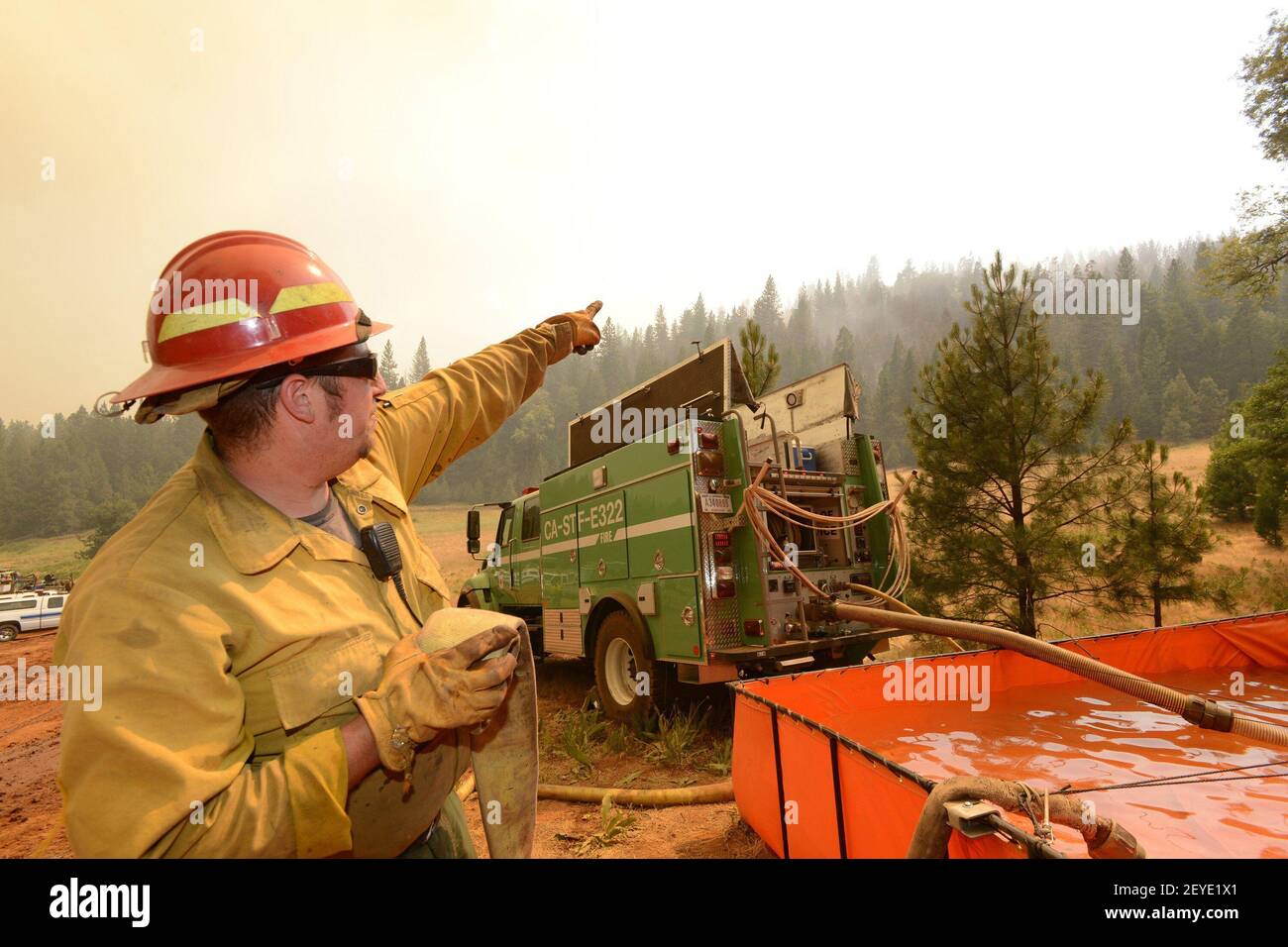 Dave McCrea, of Stanislaus National Forest SDF, points to the area ...