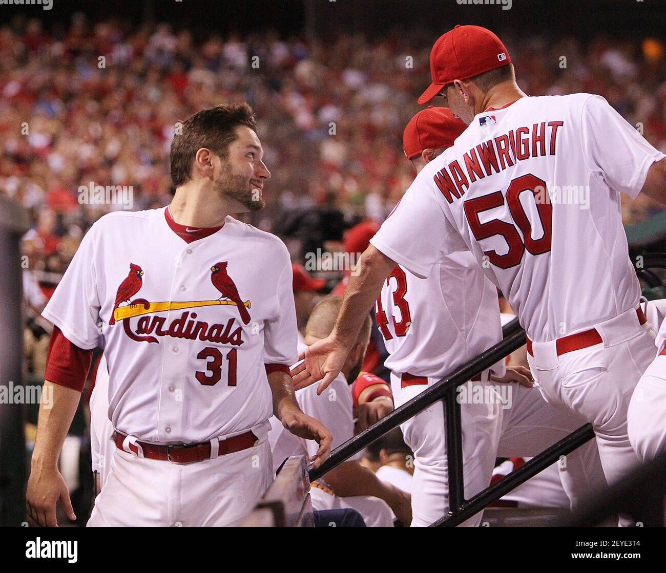 St. Louis Cardinals pitcher Adam Wainwright (50) congratulates fellow ...
