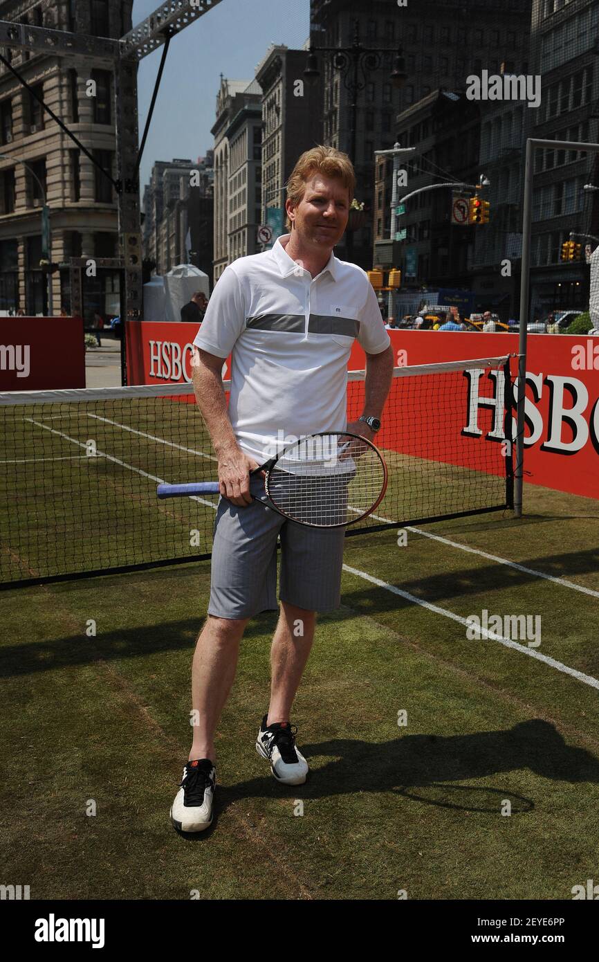 Tennis champion JIm Courier poses at the kickoff event for "HSBC Serves ...
