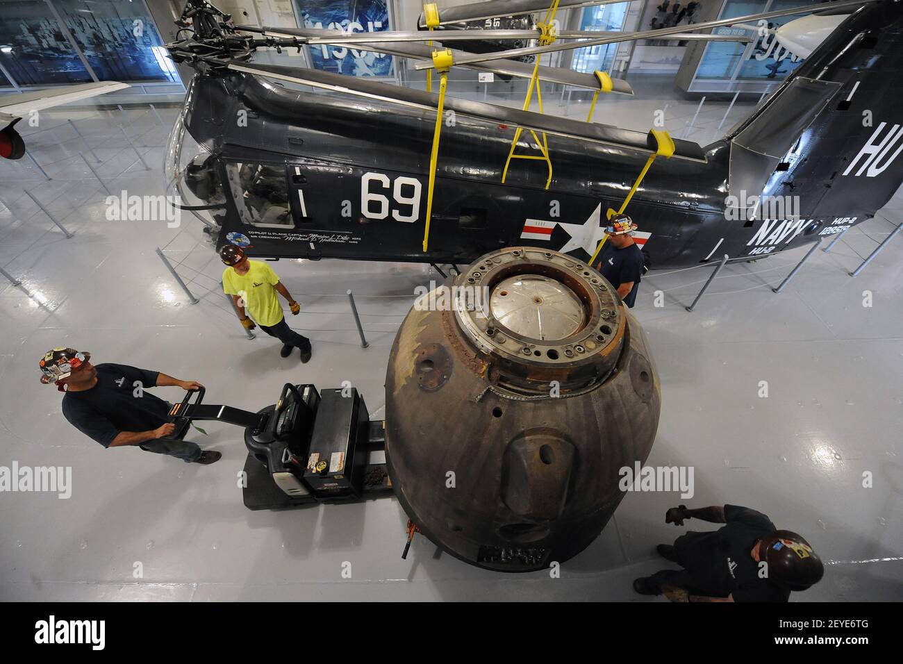 The Russian Soyuz TMA-6 space capsule slowly passes a Piasecki HUP/UH ...
