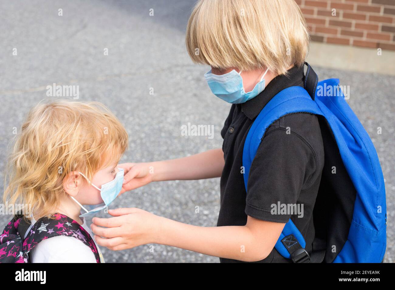 Kids in masks. Back to school concept after reopening. Schoolboy ...