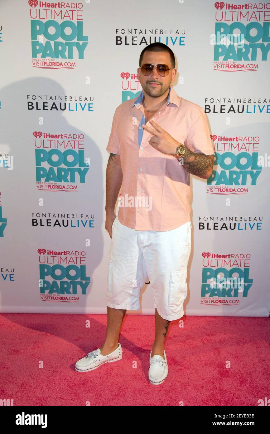 DJ Prostyle pose backstage at the iHeartRadio Ultimate Pool Party ...