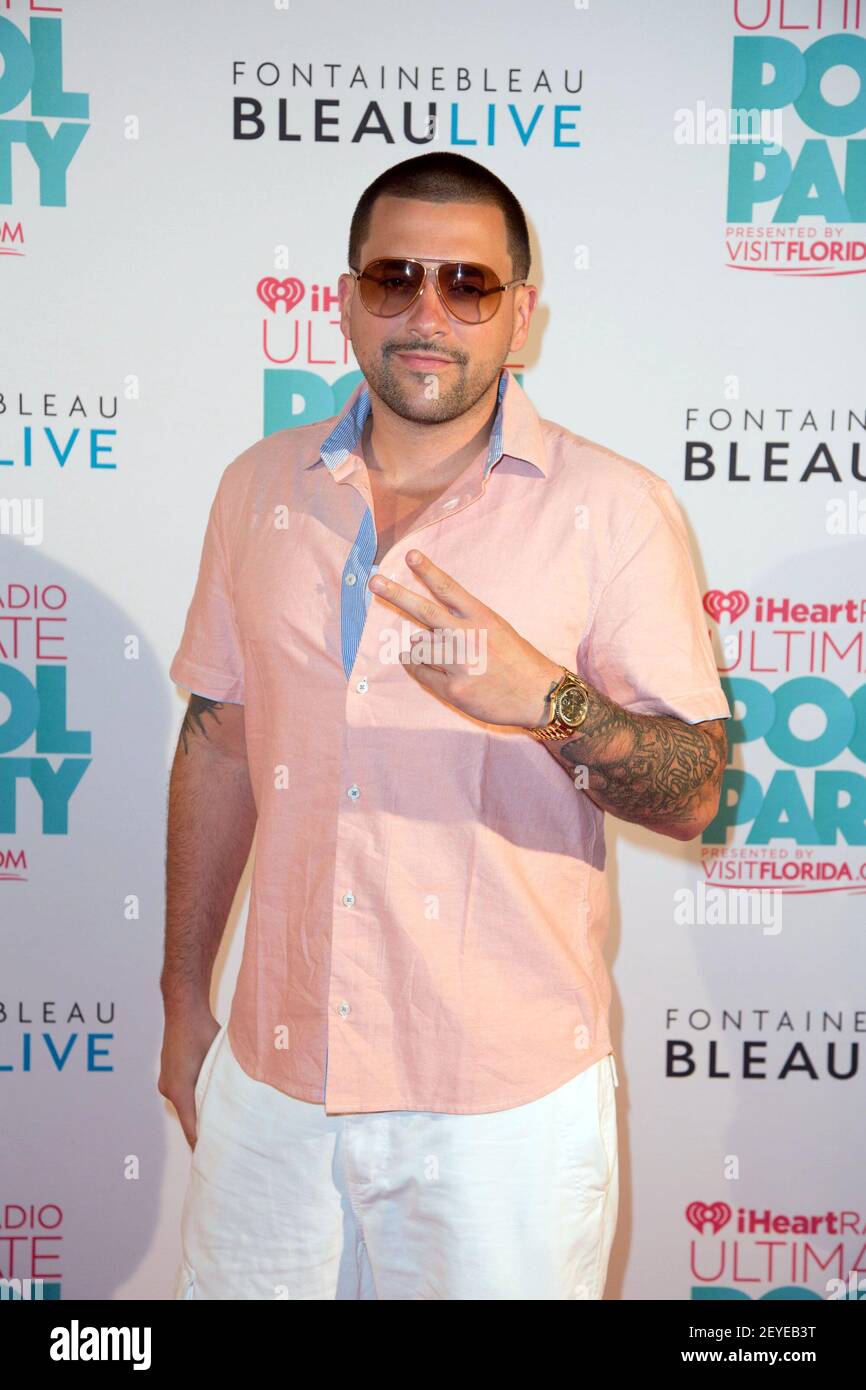 DJ Prostyle pose backstage at the iHeartRadio Ultimate Pool Party ...