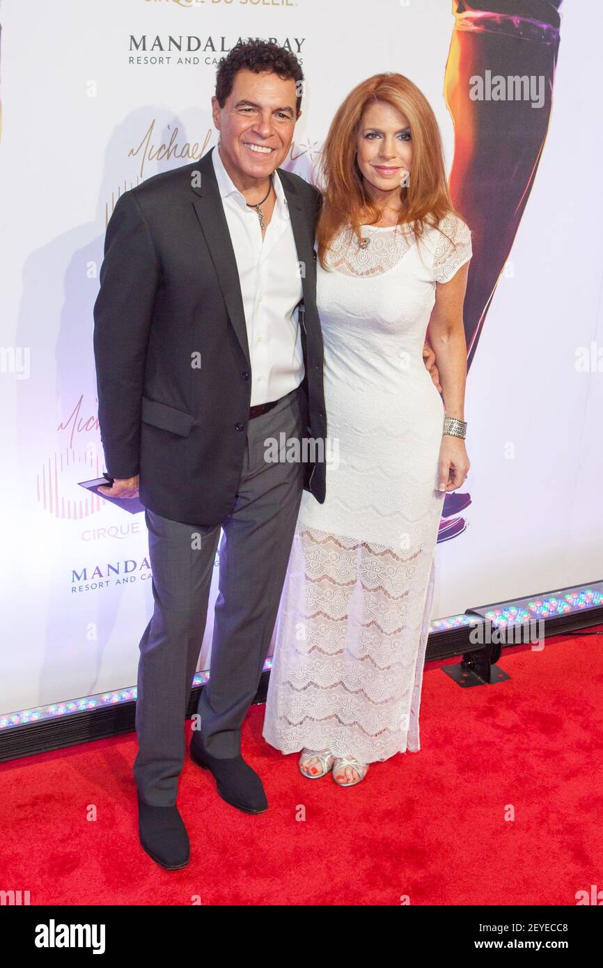(L-R) Clint Holmes and Kelly Clinton attend the Michael Jackson ONE ...