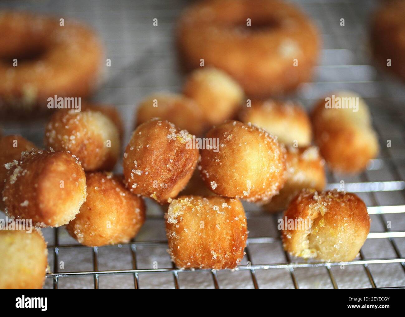Make sure you roll the "holes" in sugar for a perfect bite-sized treat ...