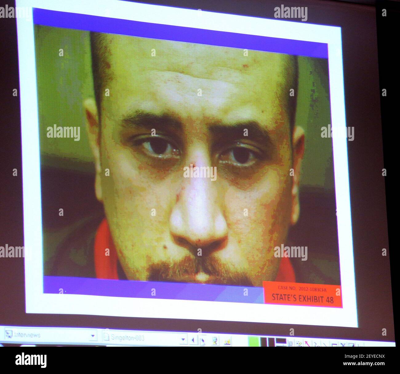 A photo of George Zimmerman taken at the Sanford police station on the ...