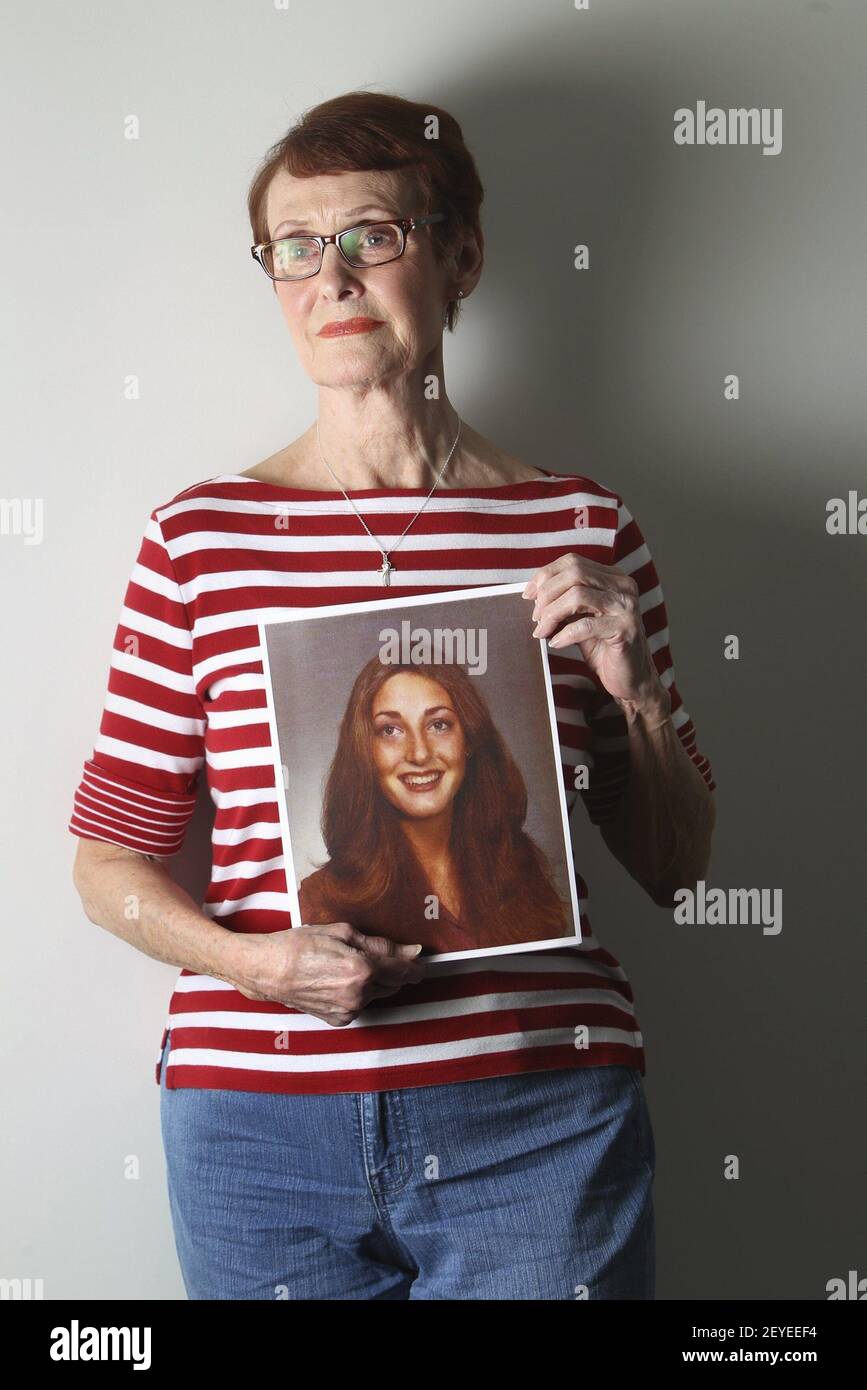 Beverly Stewart, of Overland Park, holds a photograph of her daughter ...