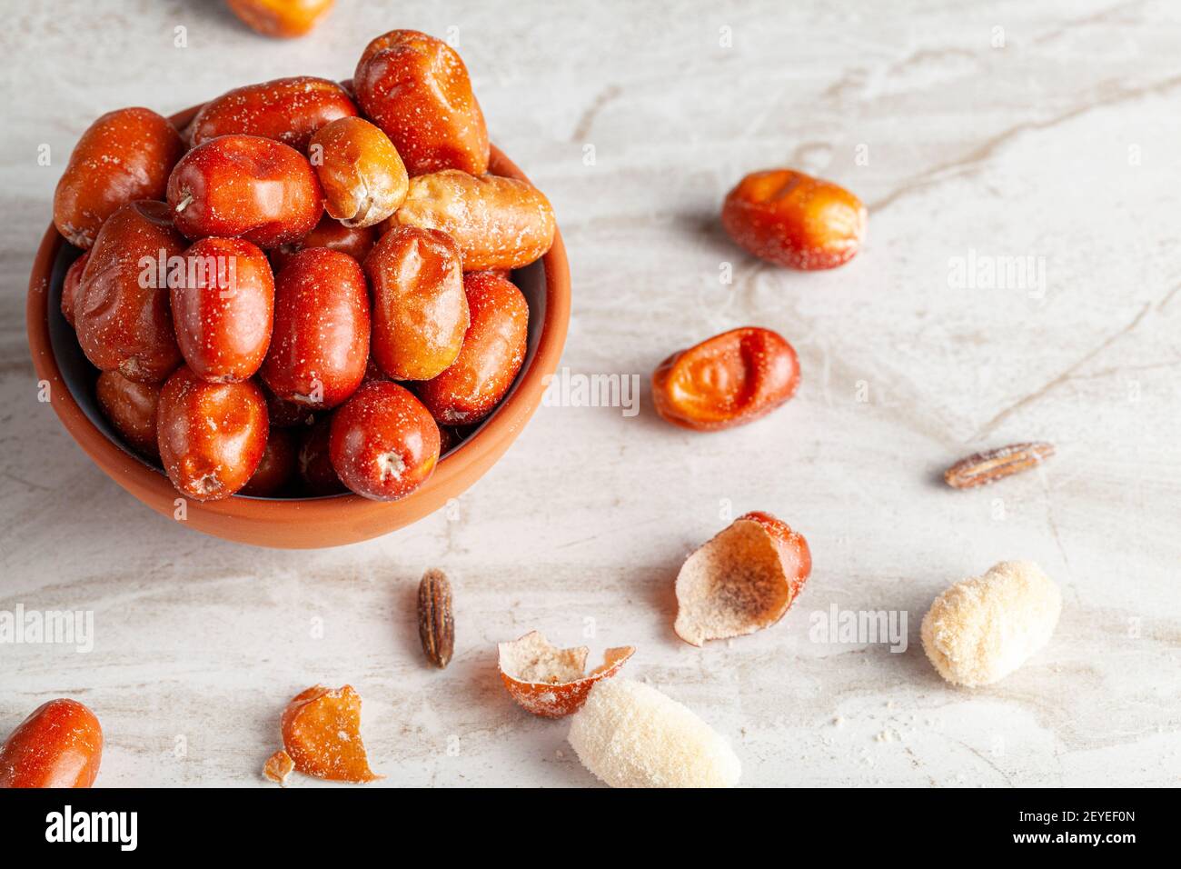 Ripe fruits of cultivated eleagnus (silverberry) plants. The nut sized ...