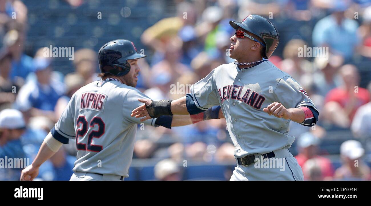 Cleveland Indians' Jason Kipnis (22) and Michael Brantley (23) greet ...
