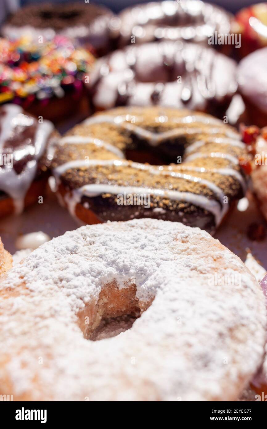 Flat lay image of fresh made store bought donuts in paper box fresh out ...