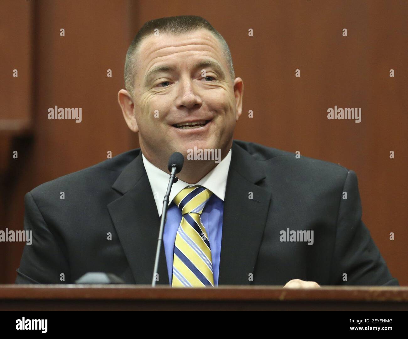 Defense law enforecement expert Dennis Root testifies in the trial of ...