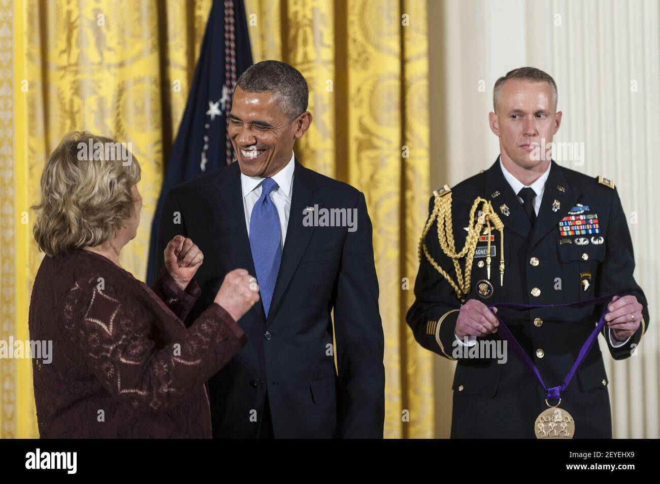 President Obama presents a 2012 National Medal of Arts to Lin Arison ...