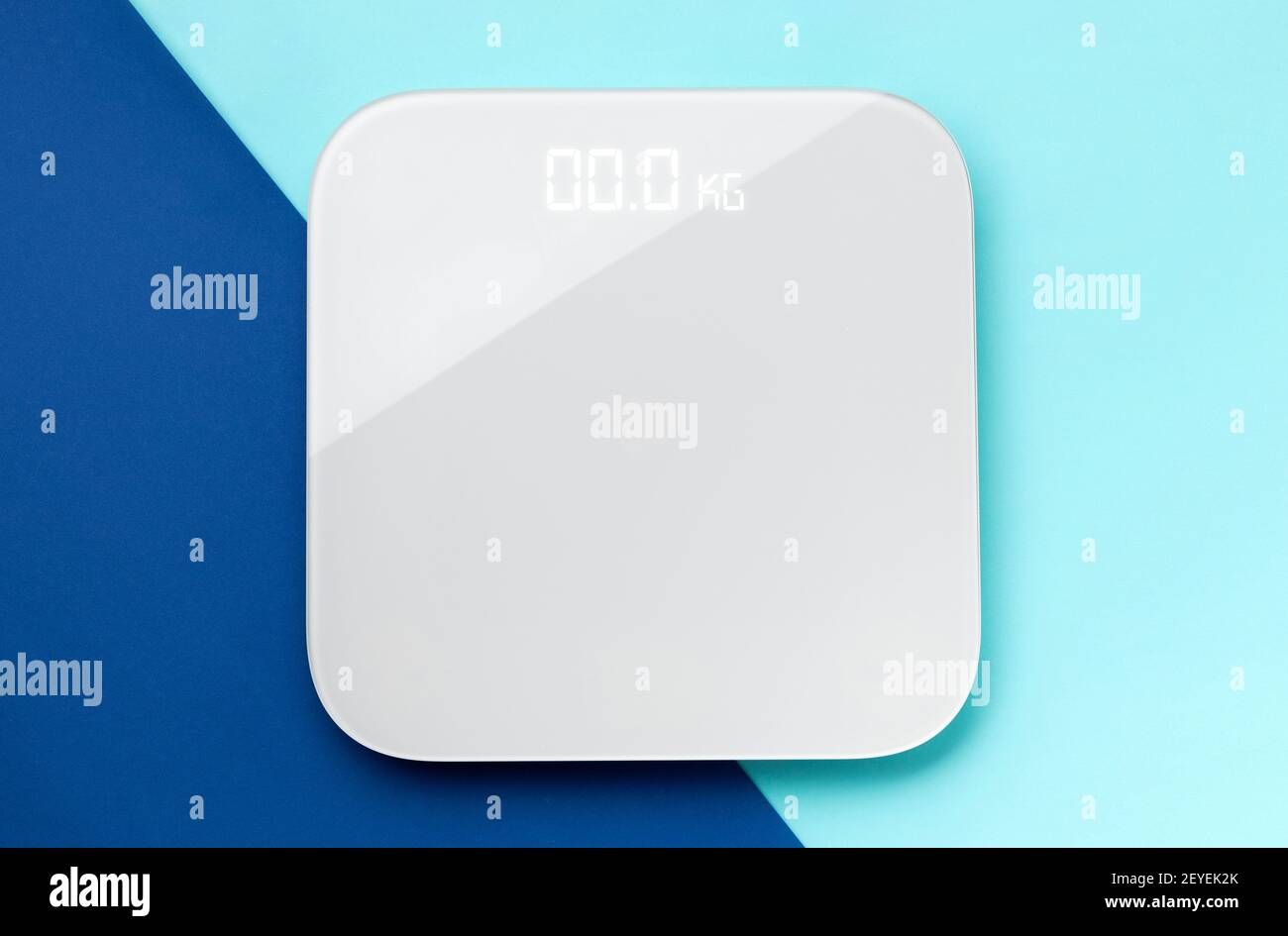 Flat lay top view scales onblue double background with copy space ...