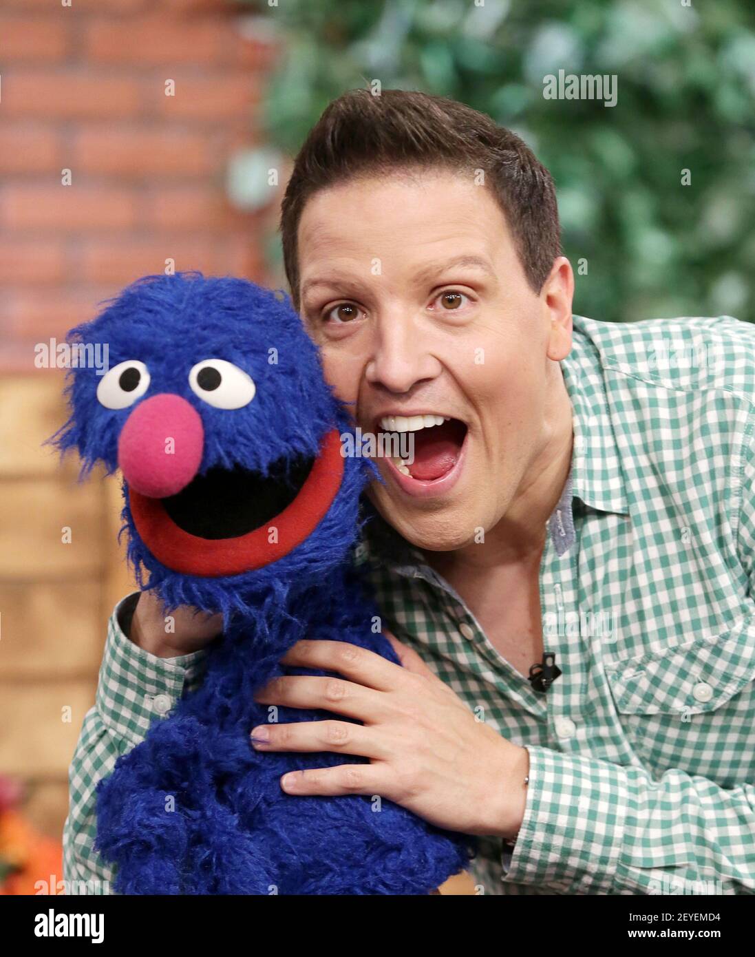 Elmo and Raul Gonzalez visit "Despierta America Univision Headquarters ...